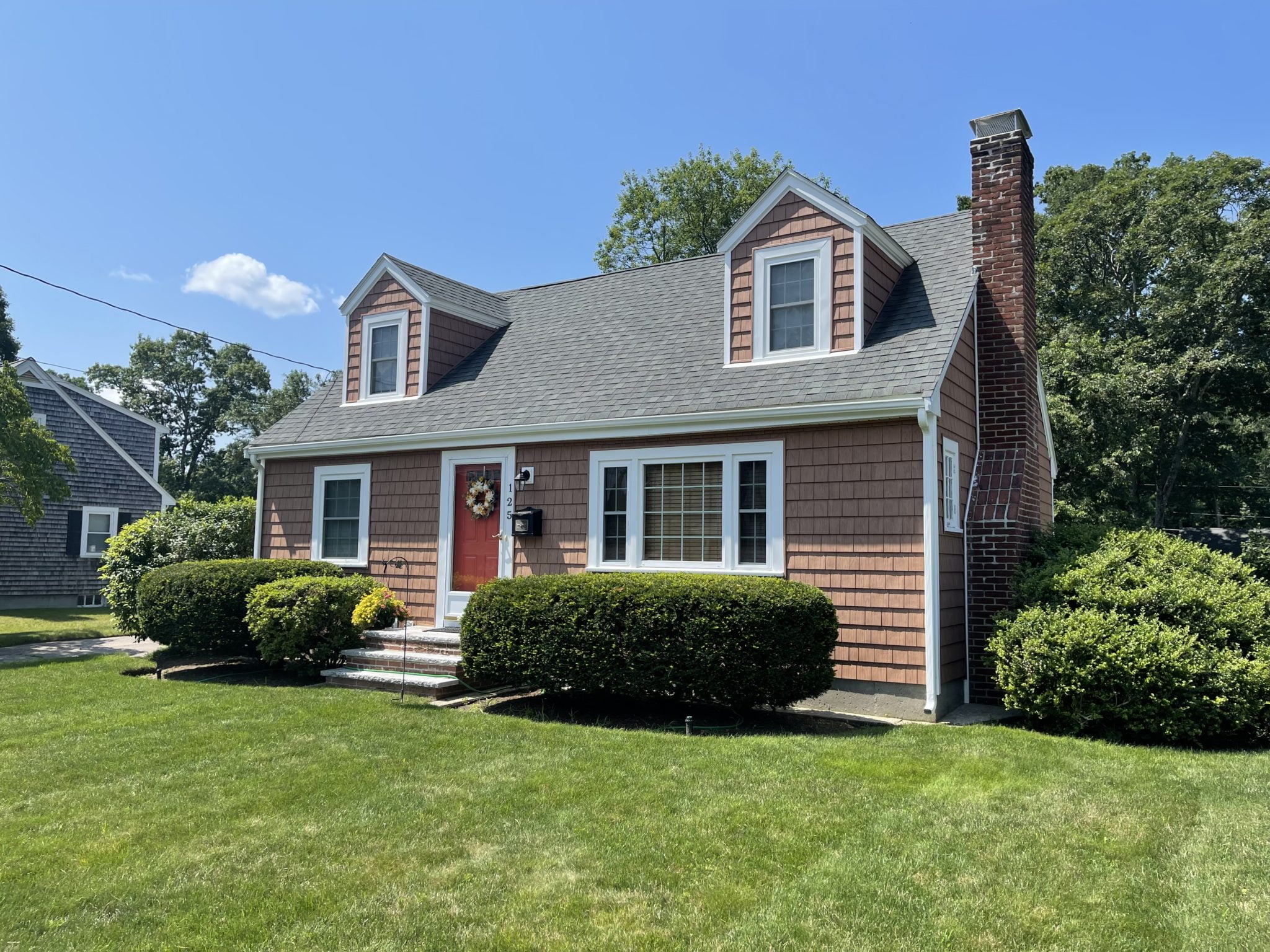 Curb Appeal Enhancement Of This Cape-Style Home
